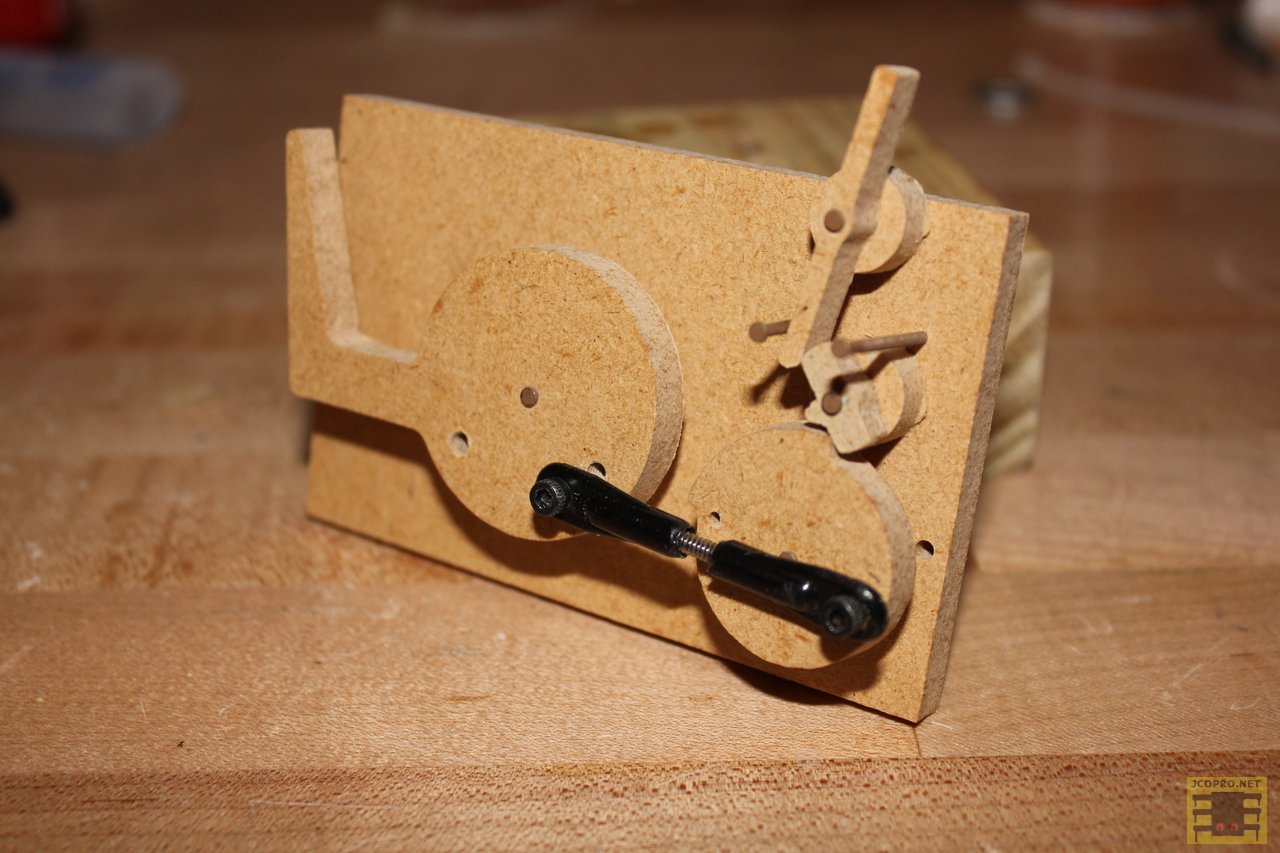 Useless-machine-mdf | Hackaday