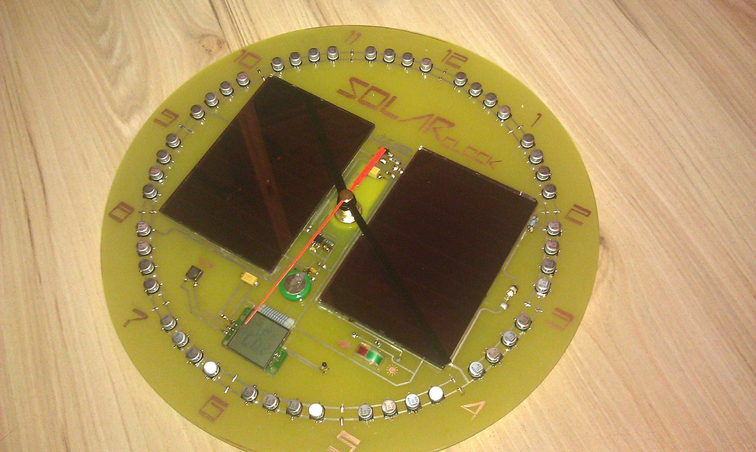 Solar Clock Uses Capacitors For Style And Function | Hackaday
