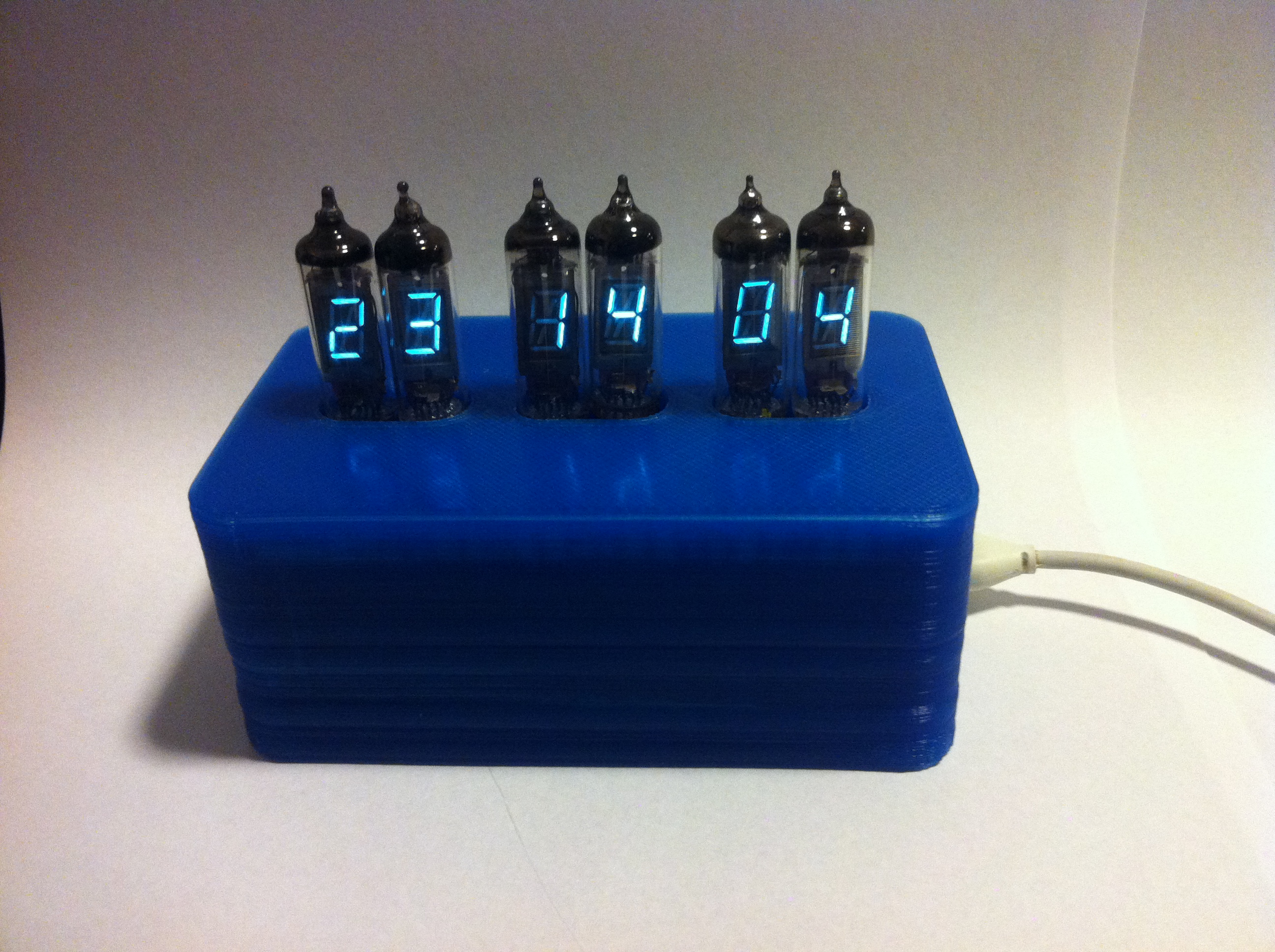 VFD Tube Clock Built Using Protoboard And Free-formed PSU | Hackaday