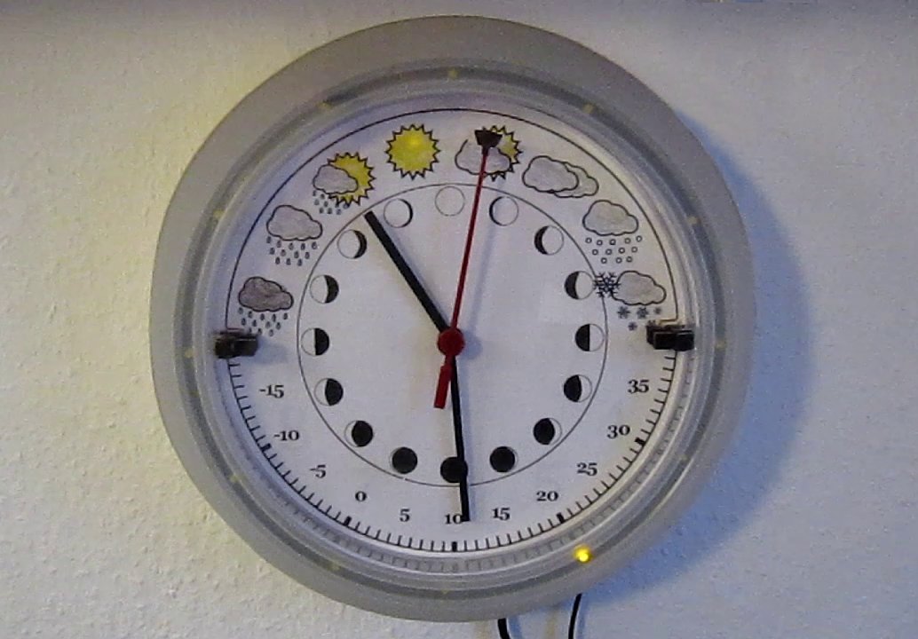 Weather Clock Puts OLPC To Work | Hackaday