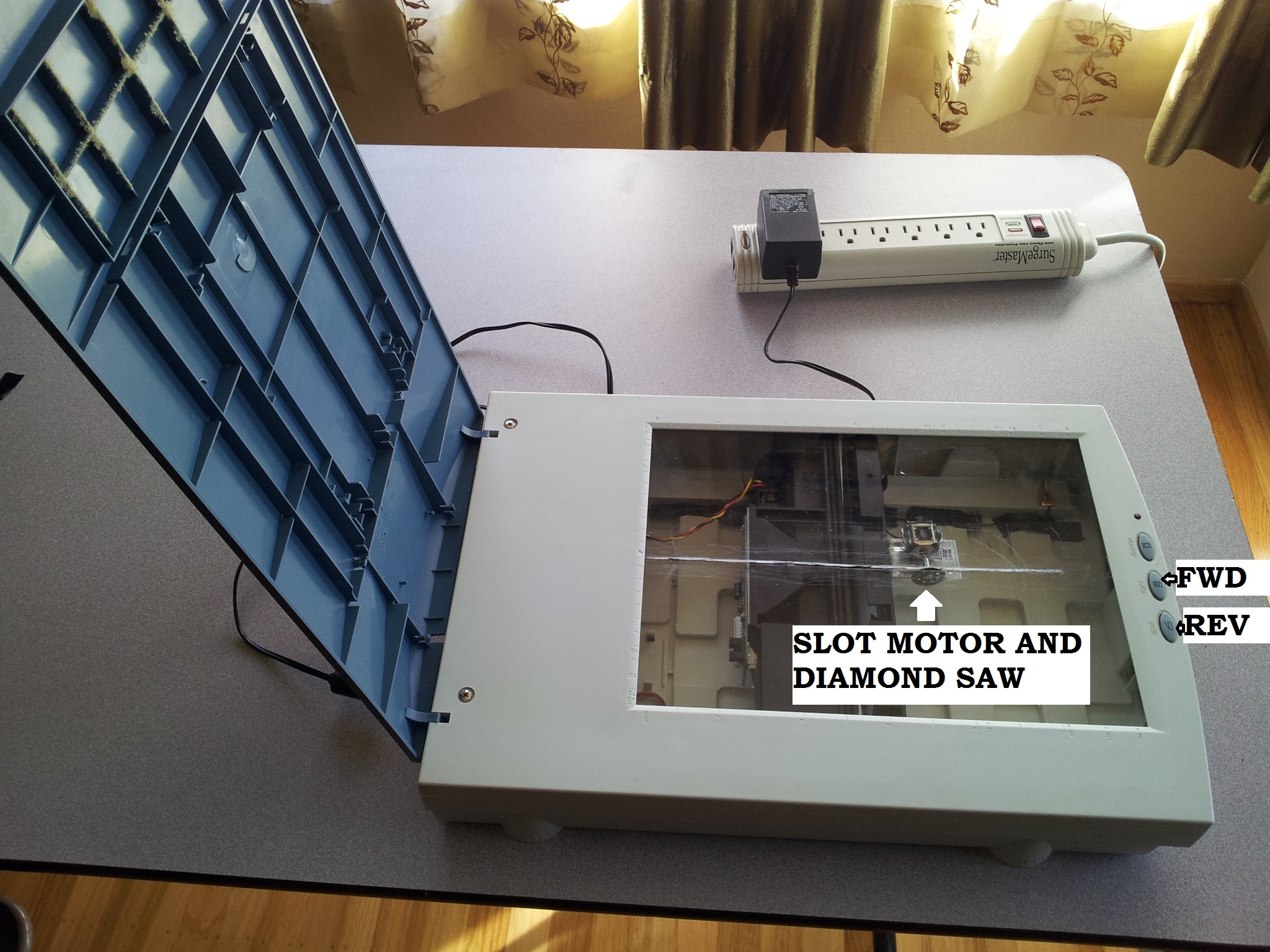 Automated Table Saw Cuts Photovoltaic Solar Cells | Hackaday