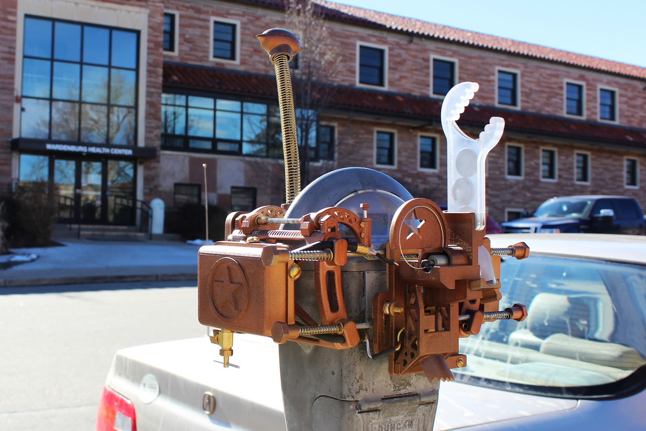 Auto-Meter Reader Feeder Keeps Meter-Maids At Bay | Hackaday