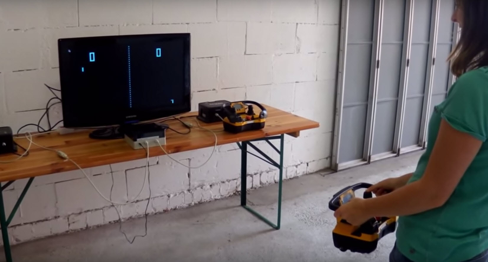Playing Pong With Construction Crane Controllers? | Hackaday