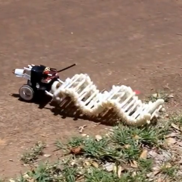 Crawling-swimming-and-climbing-with-a-3d-printed-wave-producing-robot ...