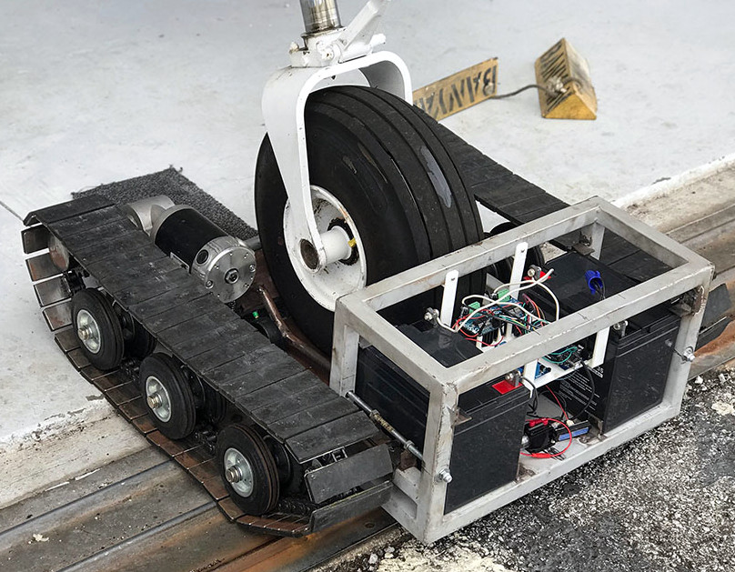 An Arduino Powered Tank Built To Pull Planes | Hackaday