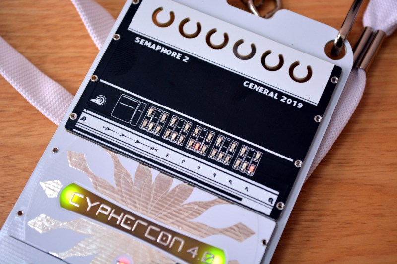 Cyphercon-badge-semiphore-plate | Hackaday