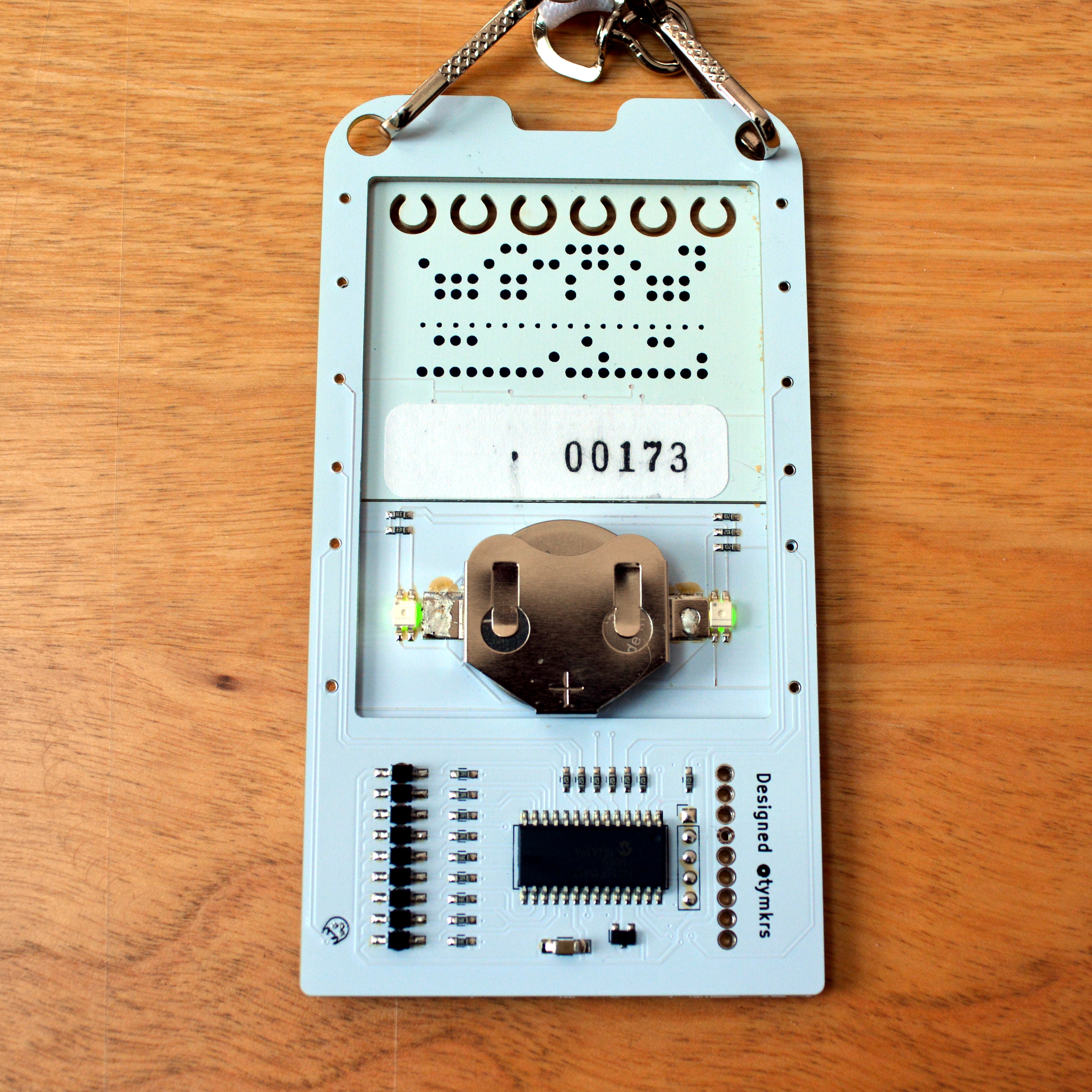 Cyphercon Badge Has A Paper Tape Reader Built In | Hackaday