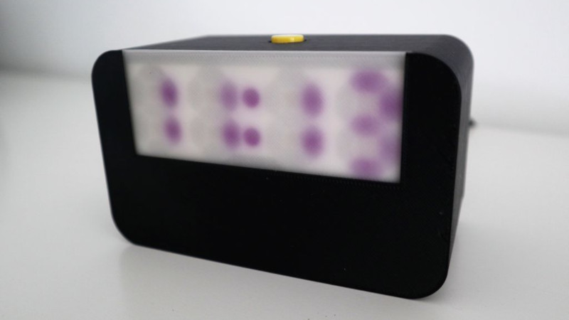Photochromic Screen Makes For An Interesting Clock | Hackaday