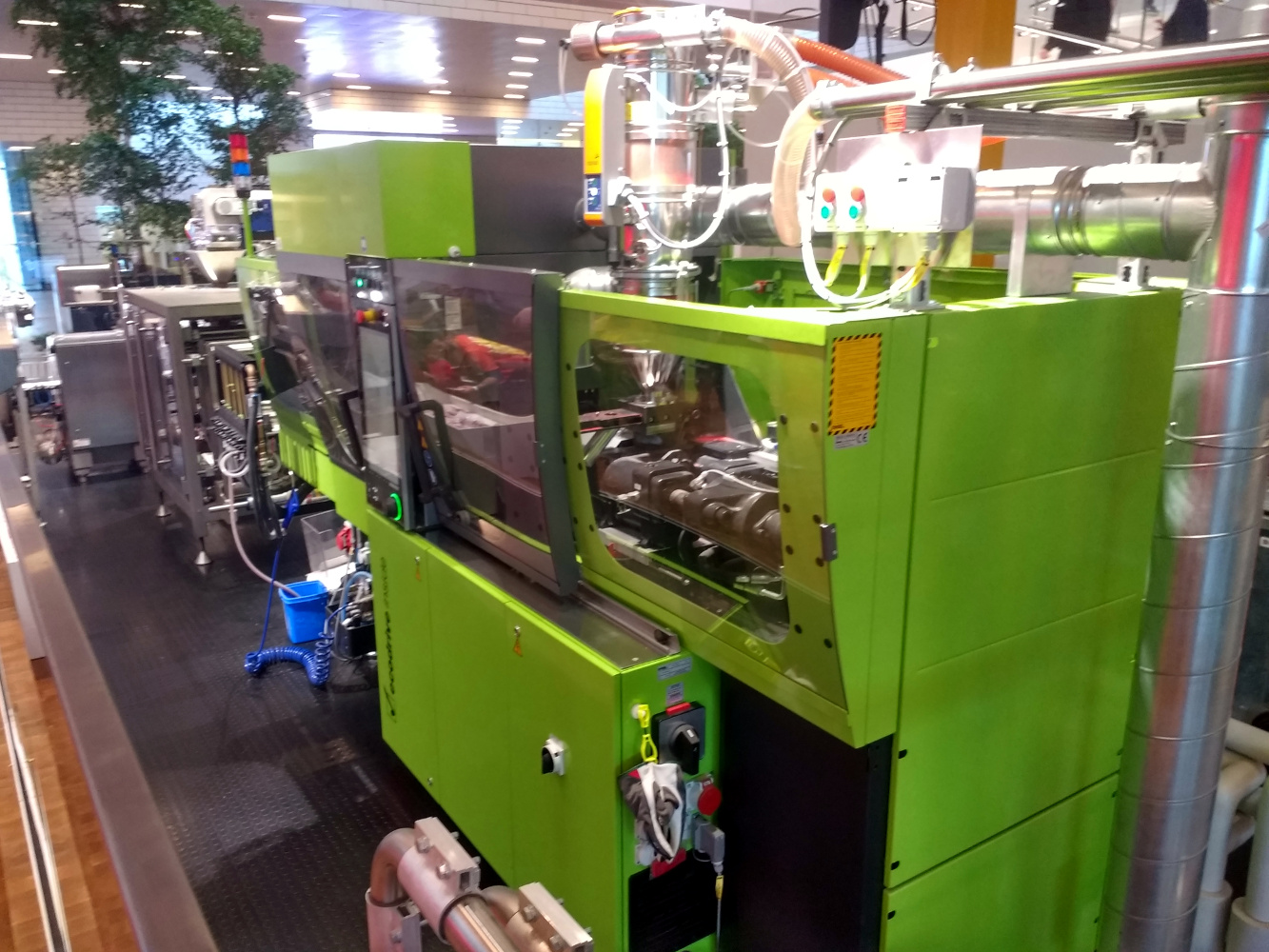 Legohouse-productionline-moulding-machine | Hackaday