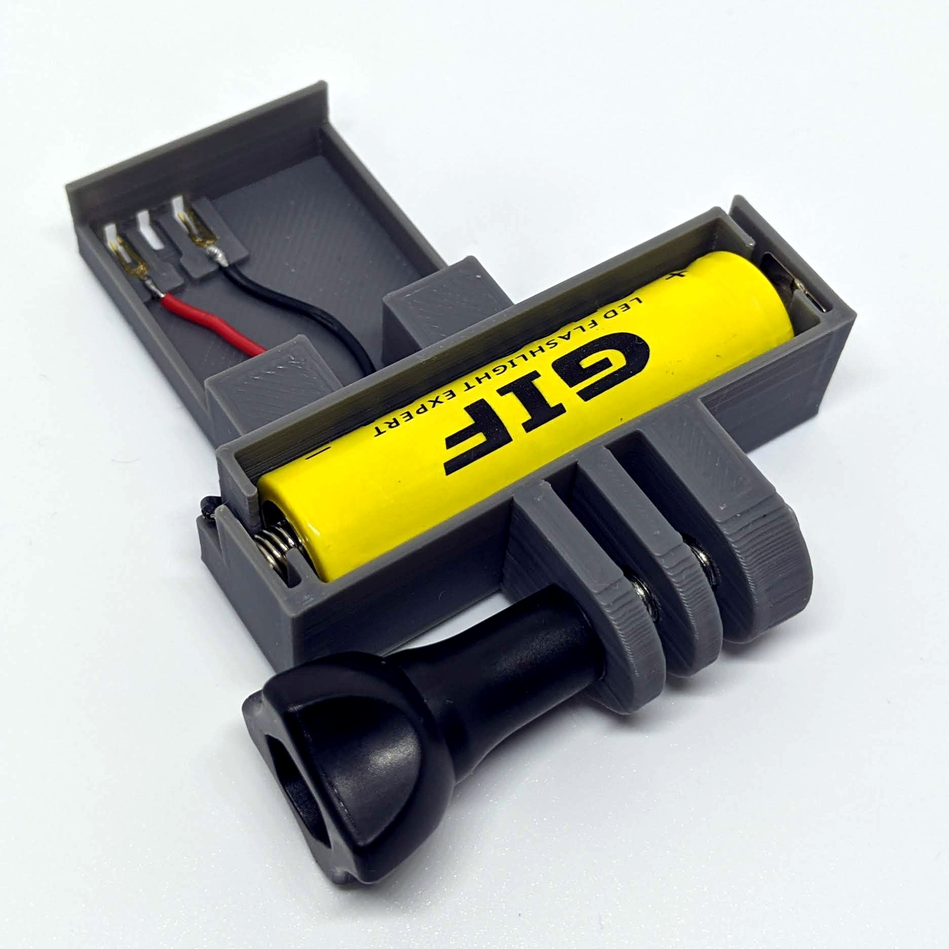 External Battery Mod For Action Camera Does It Non-destructively | Hackaday