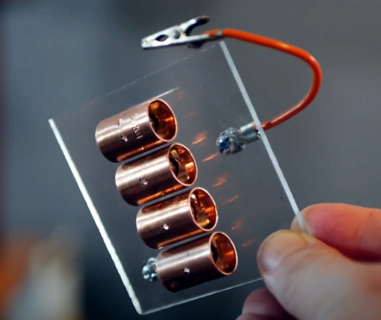 This (mostly) Transparent Tesla Coil Shows It All | Hackaday