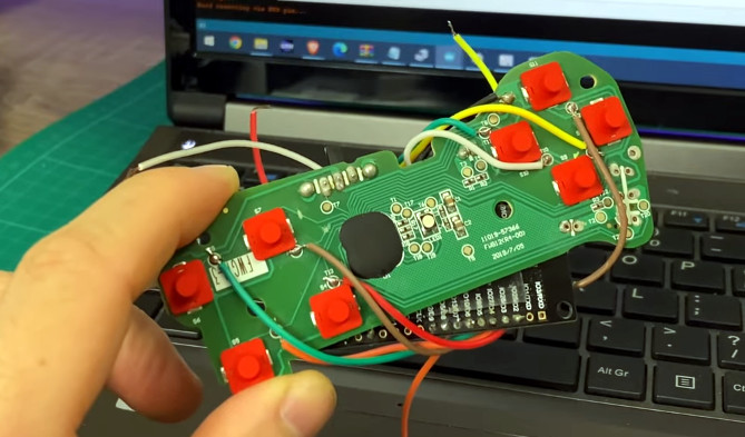 Turning A Toy Gamepad Into A Real One, With Bluetooth | Hackaday