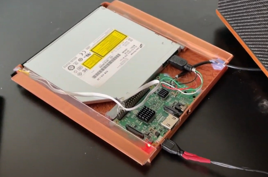 Custom Slimline CD Player Hides Out Under Speaker | Hackaday